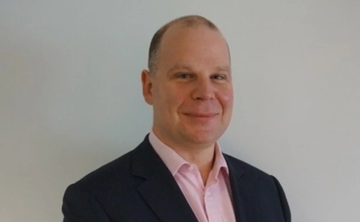 Academy names CEO as Normand steps back - Insurance Post